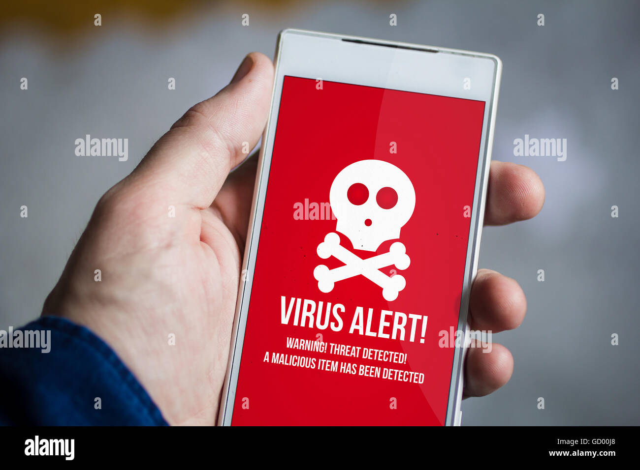 man hand holding virus alert smartphone. All screen graphics are made ...