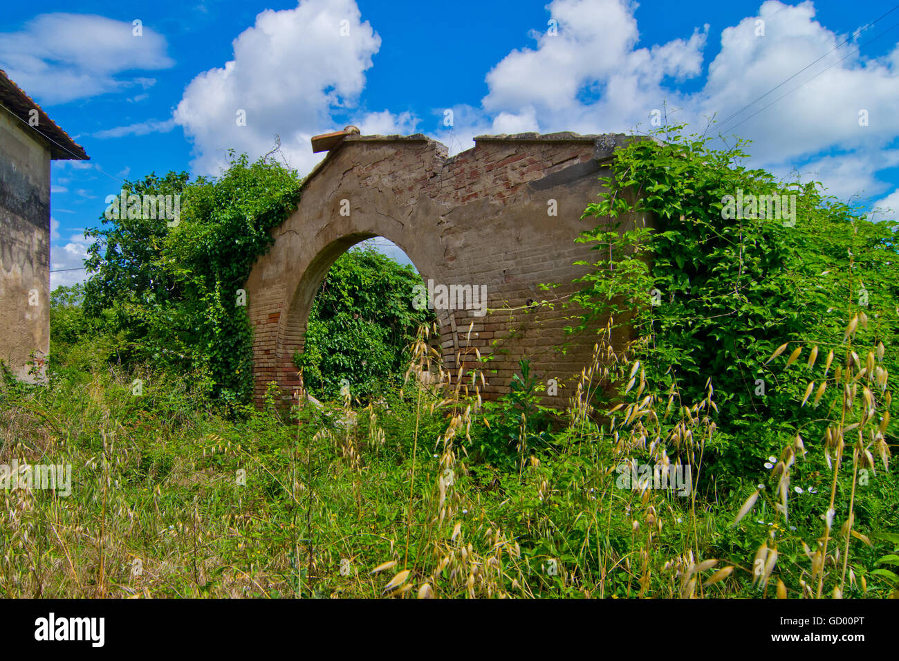 old building barn with collapsed roof, broken beams and fallen walls ...