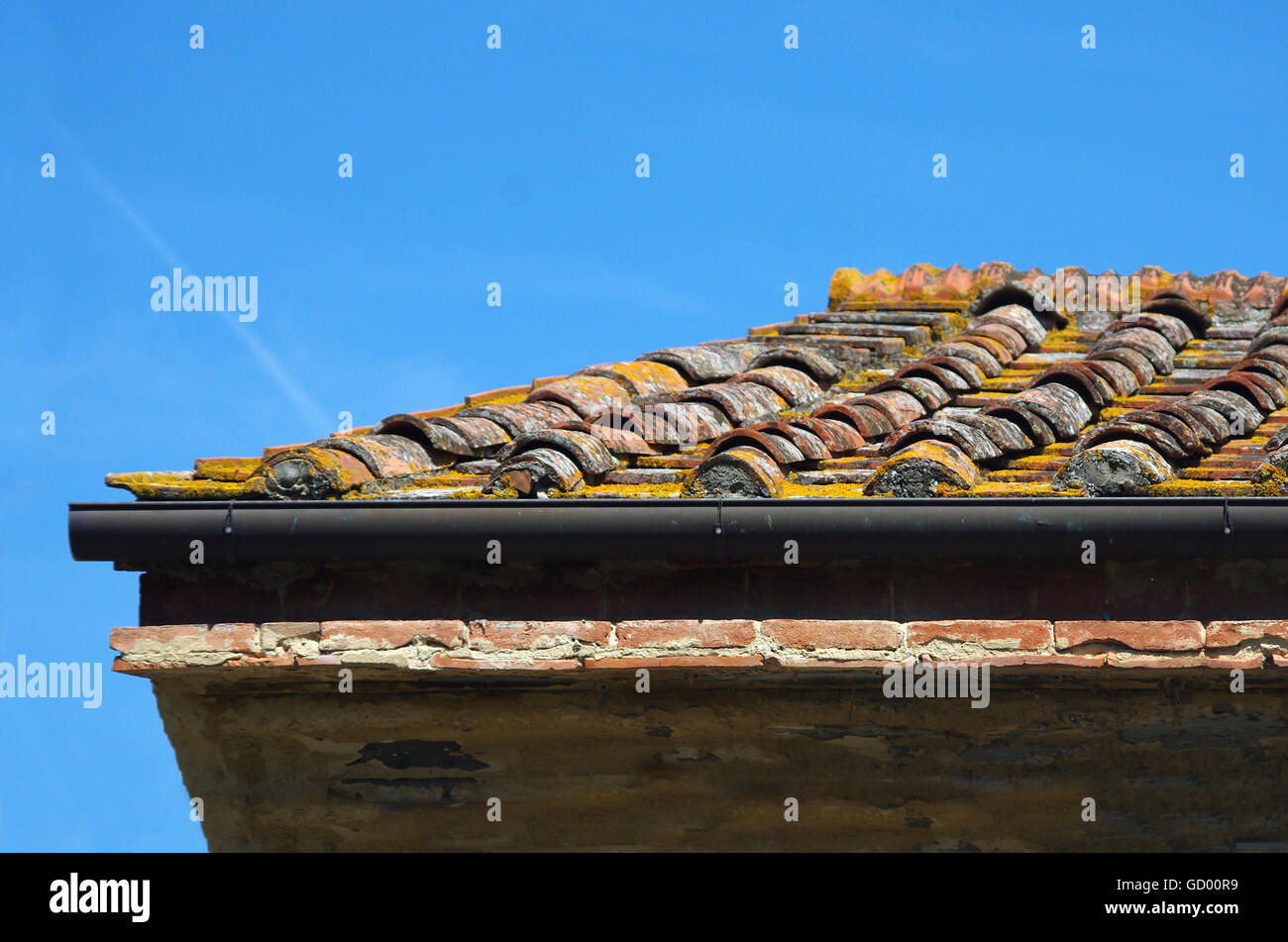 traditional roof tile with tiles and cement and plaster of historic ...