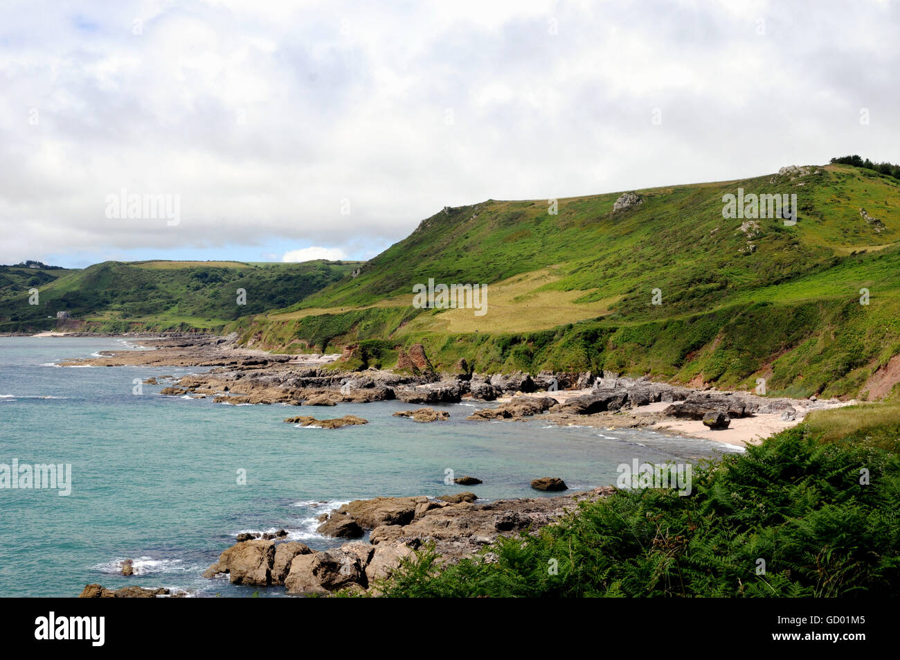 The South West Coastal Path as it passes along the rugged coastline of ...
