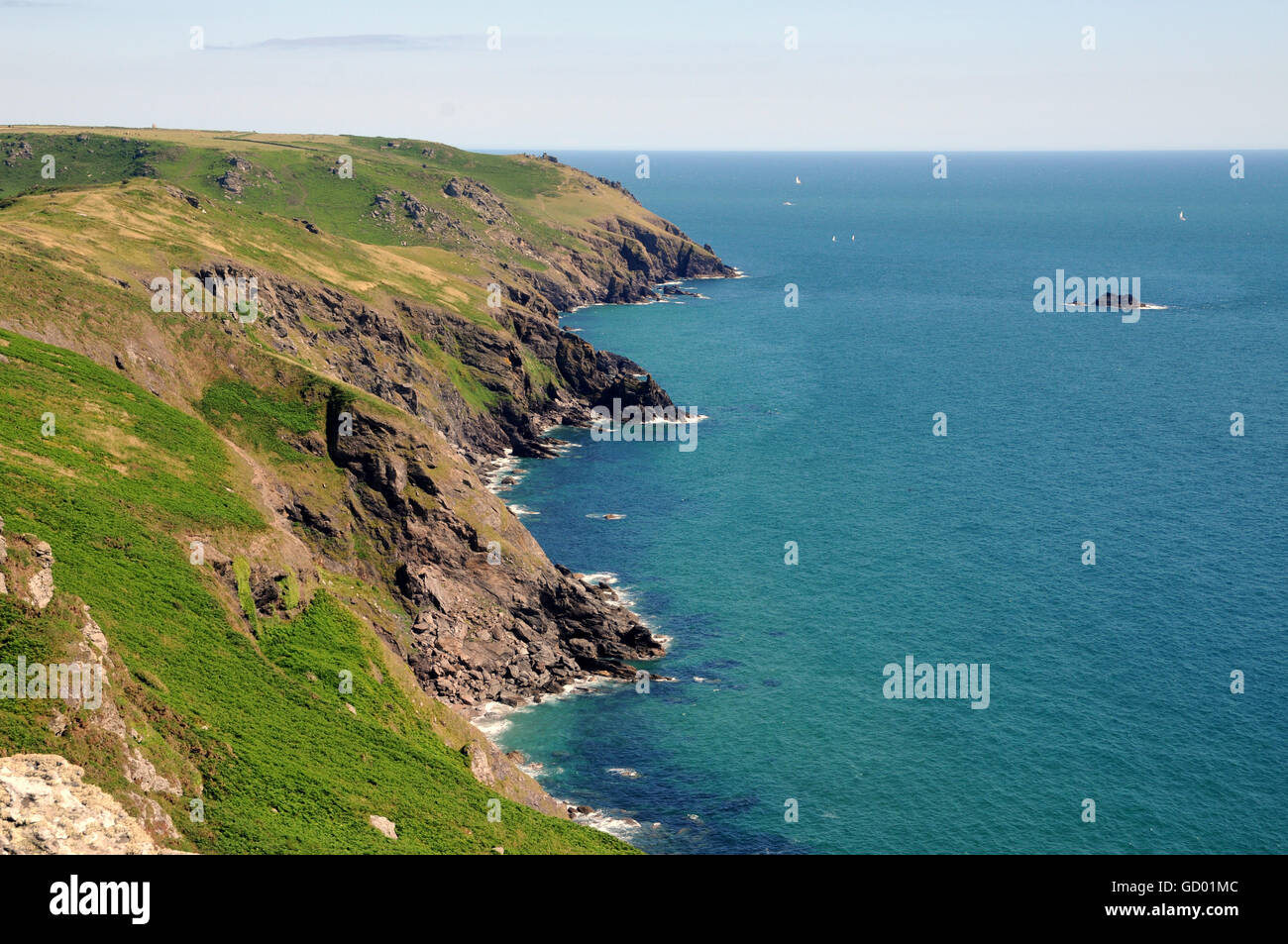 The South West Coastal Path as it passes along the rugged coastline of ...