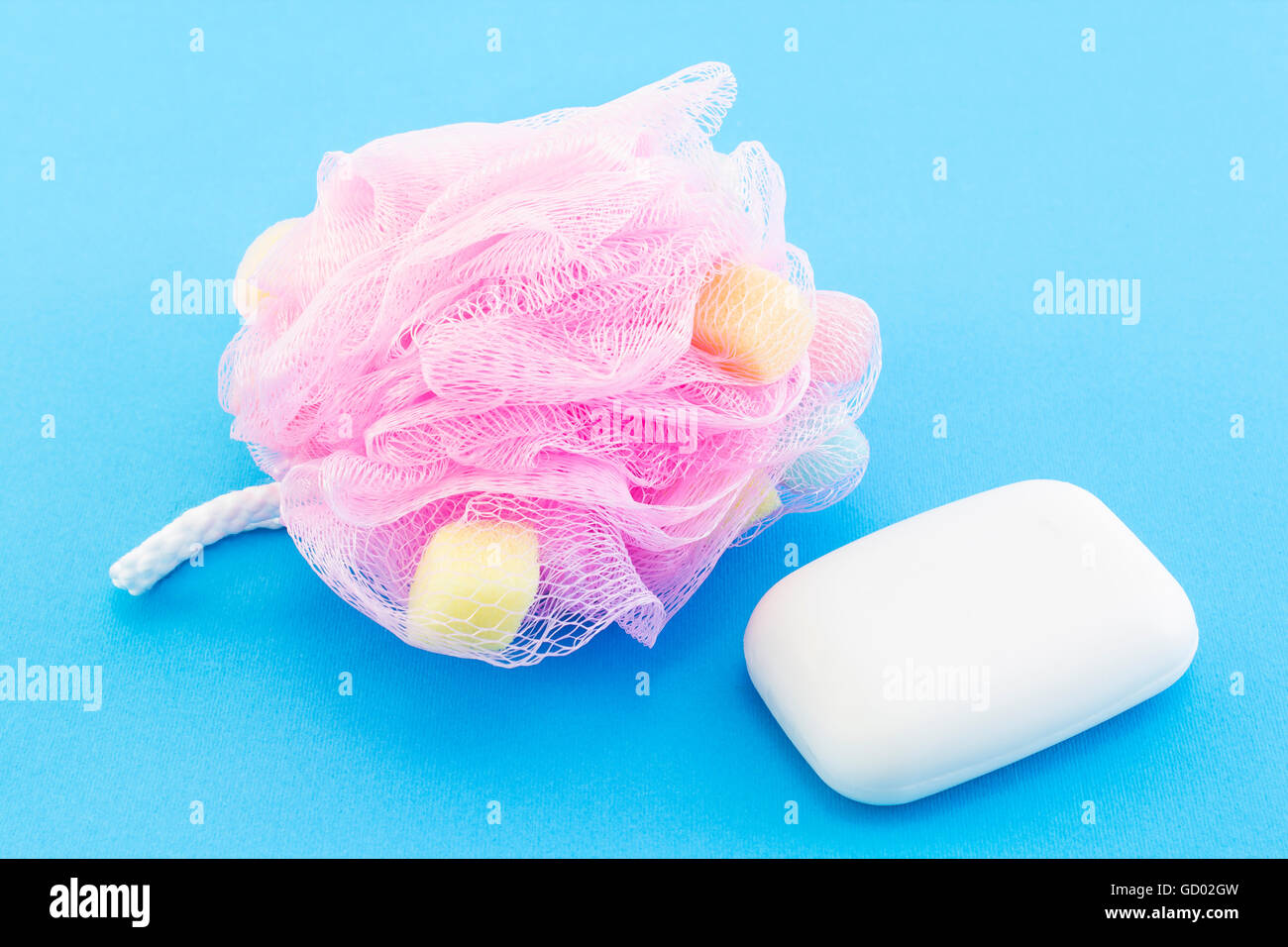 Pink Bath Puff and Soap Stock Photo - Alamy