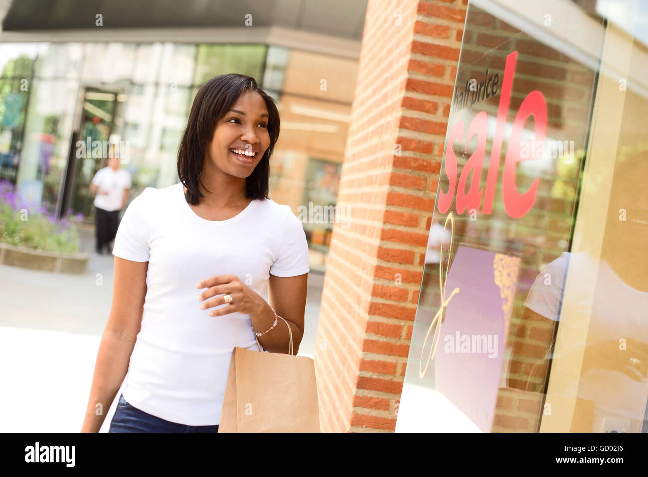 young woman going shopping Stock Photo - Alamy