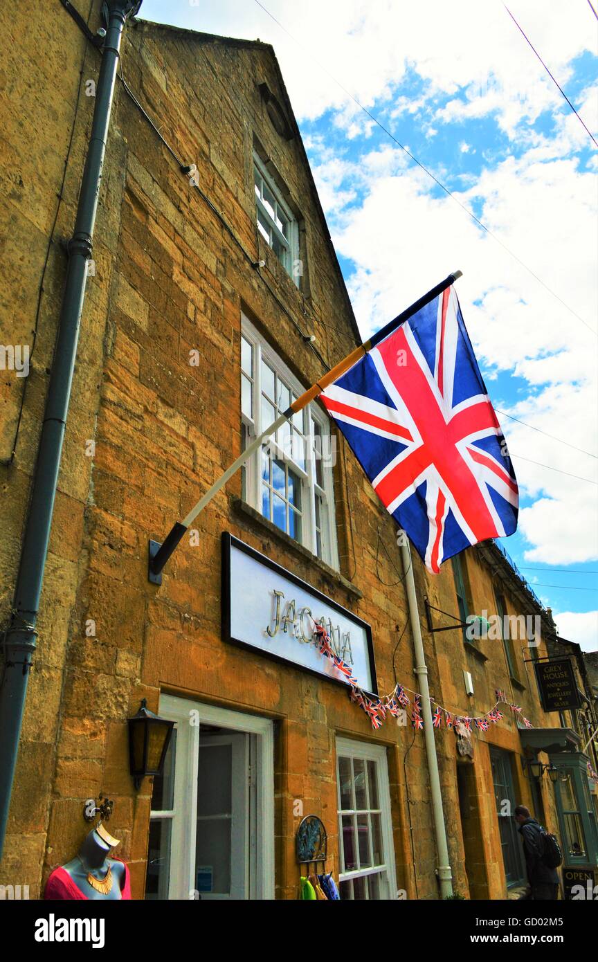 English Union Jack Against Sandstone Building Stock Photo - Alamy