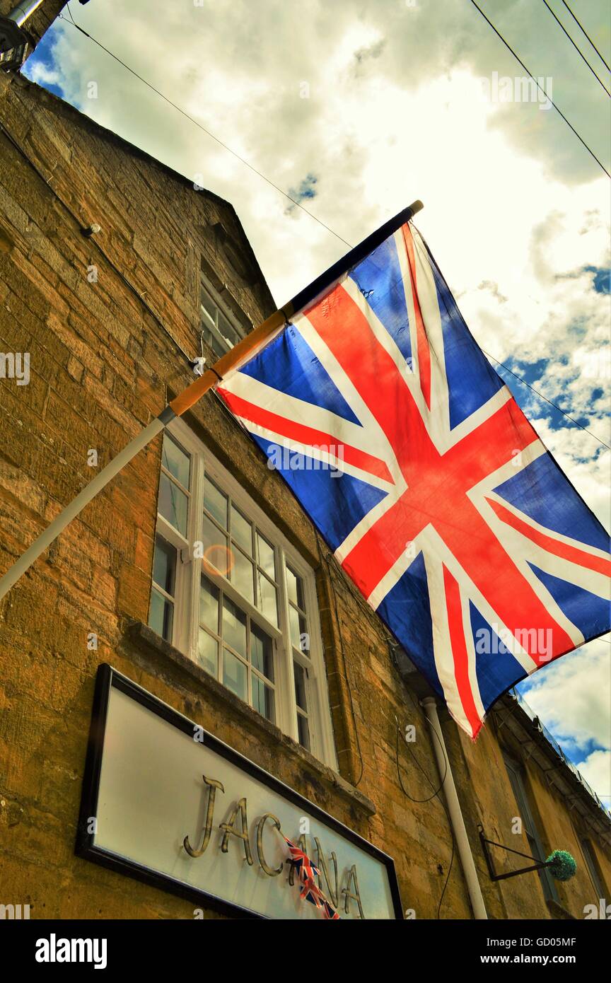 English Union Jack against Sandstone Building Stock Photo - Alamy