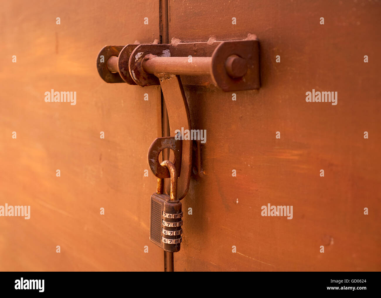 old lock on bronze metal garage door Stock Photo - Alamy