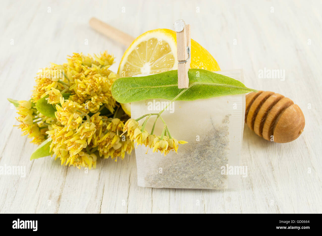 Linden Tea beg with fresh flowers and lemon Stock Photo - Alamy