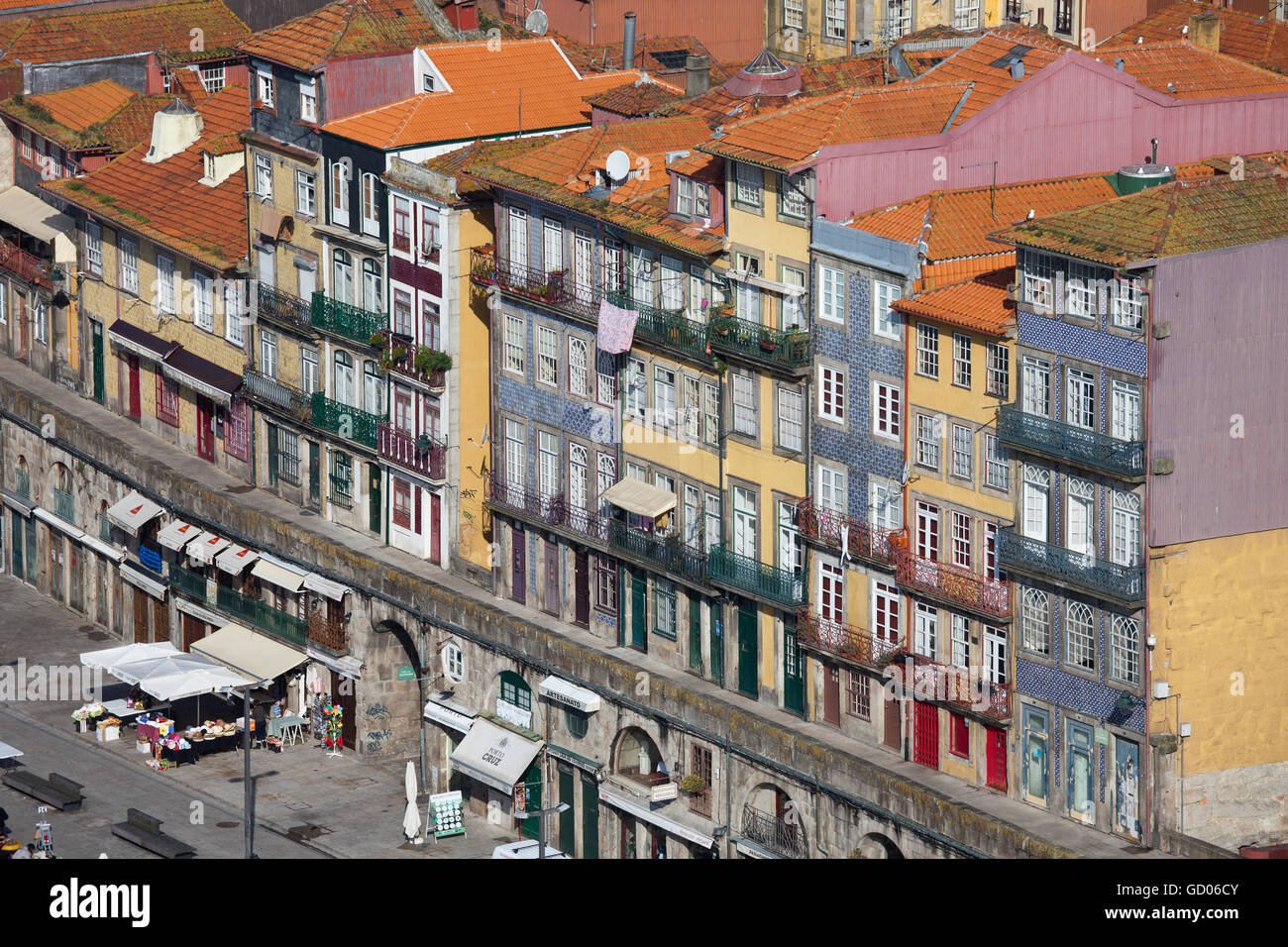 Traditional Portuguese houses with tiled facade in historic city centre ...