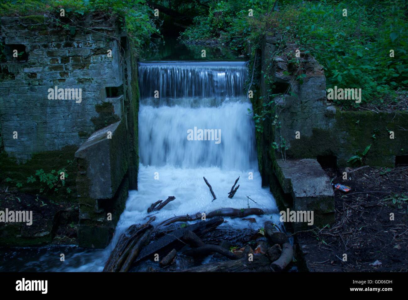 Waterfall That was part of a watermill Stock Photo - Alamy