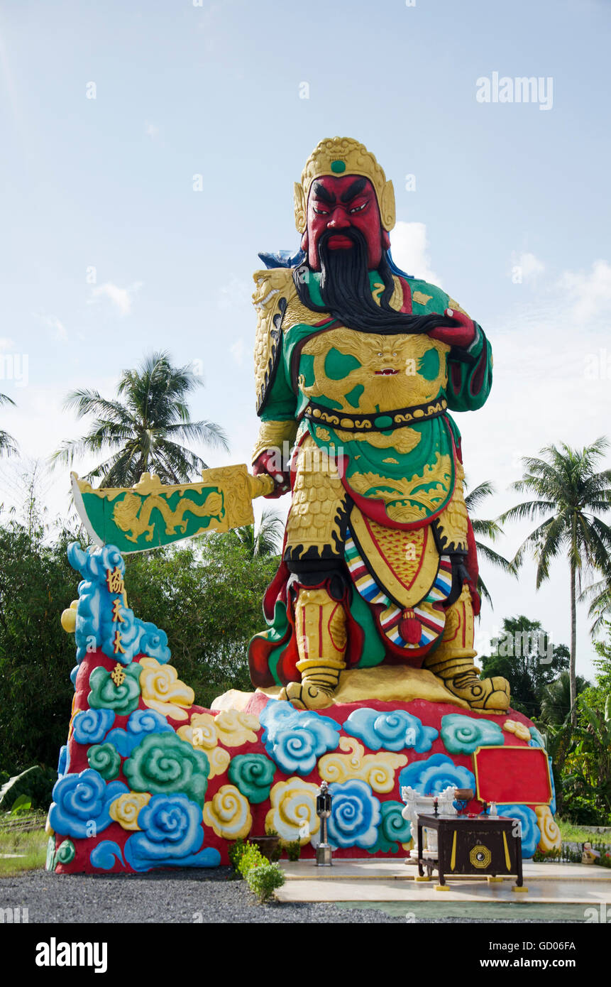 Colorful Guan Yu Statue at outdoor in chinese temple for people praying ...