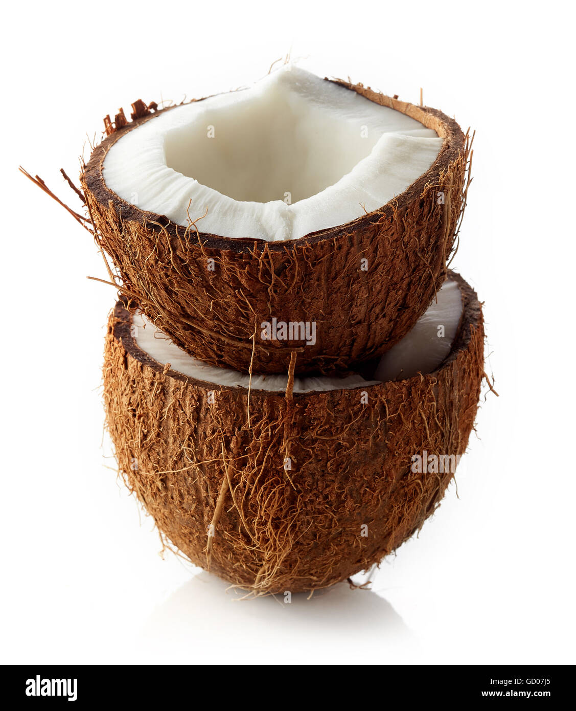 Coconut halves isolated on white background Stock Photo - Alamy