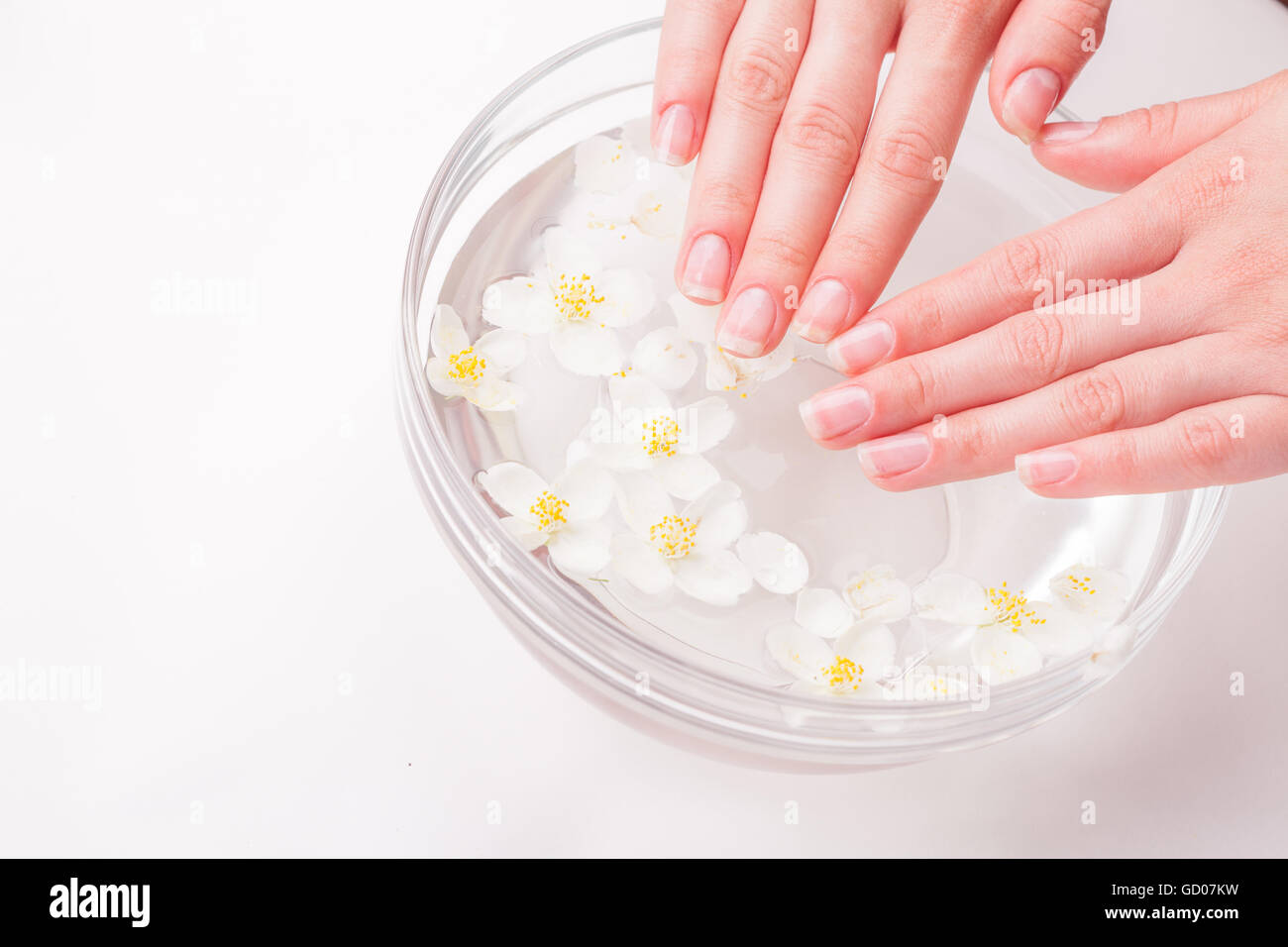 Woman hands in bath with water Stock Photo - Alamy