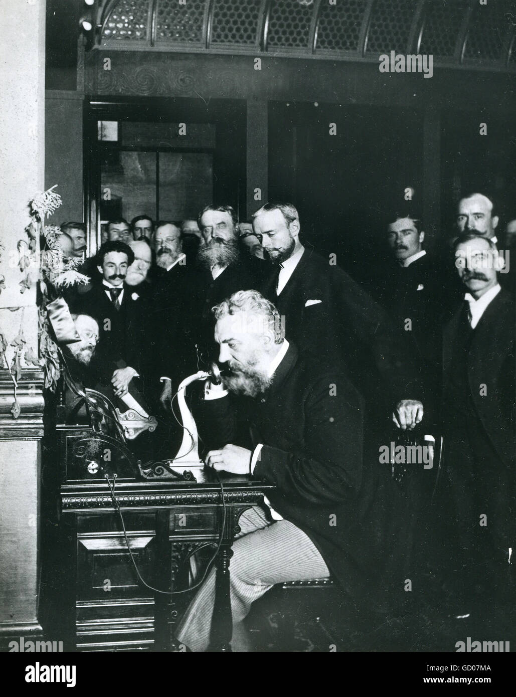 Photo of Alexander Graham Bell, inventor of the telephone, talking into ...