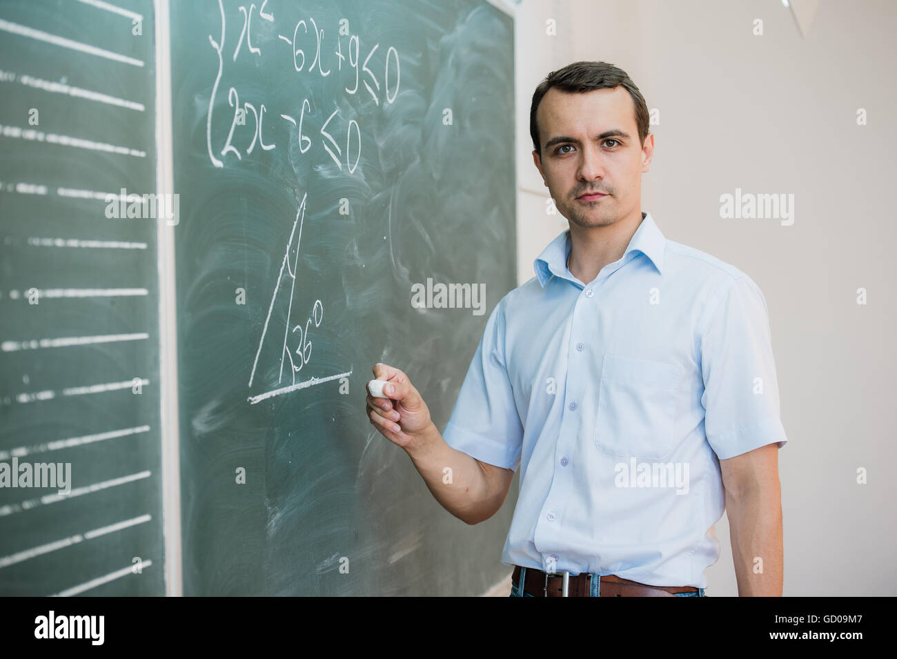 Young professor chalk board hi-res stock photography and images - Alamy