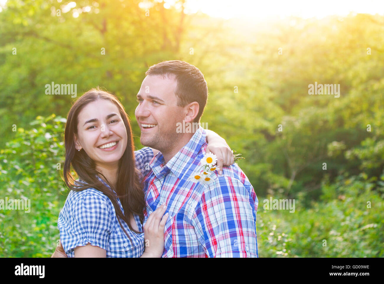 Young happy couple in love in spring day. Outdoors portrait Stock Photo ...