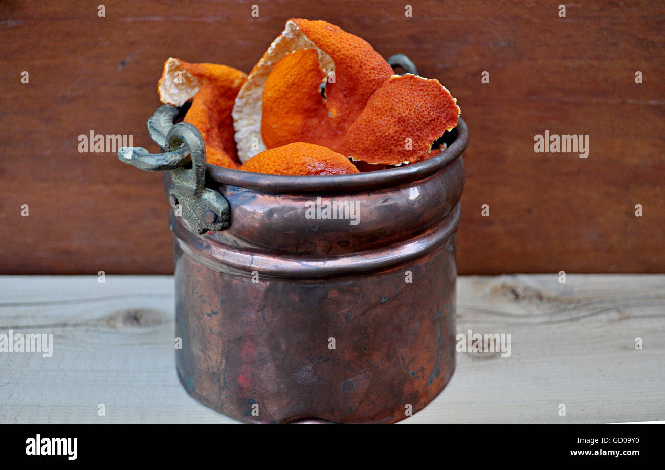 copper cauldrons with dried orange peel Stock Photo - Alamy