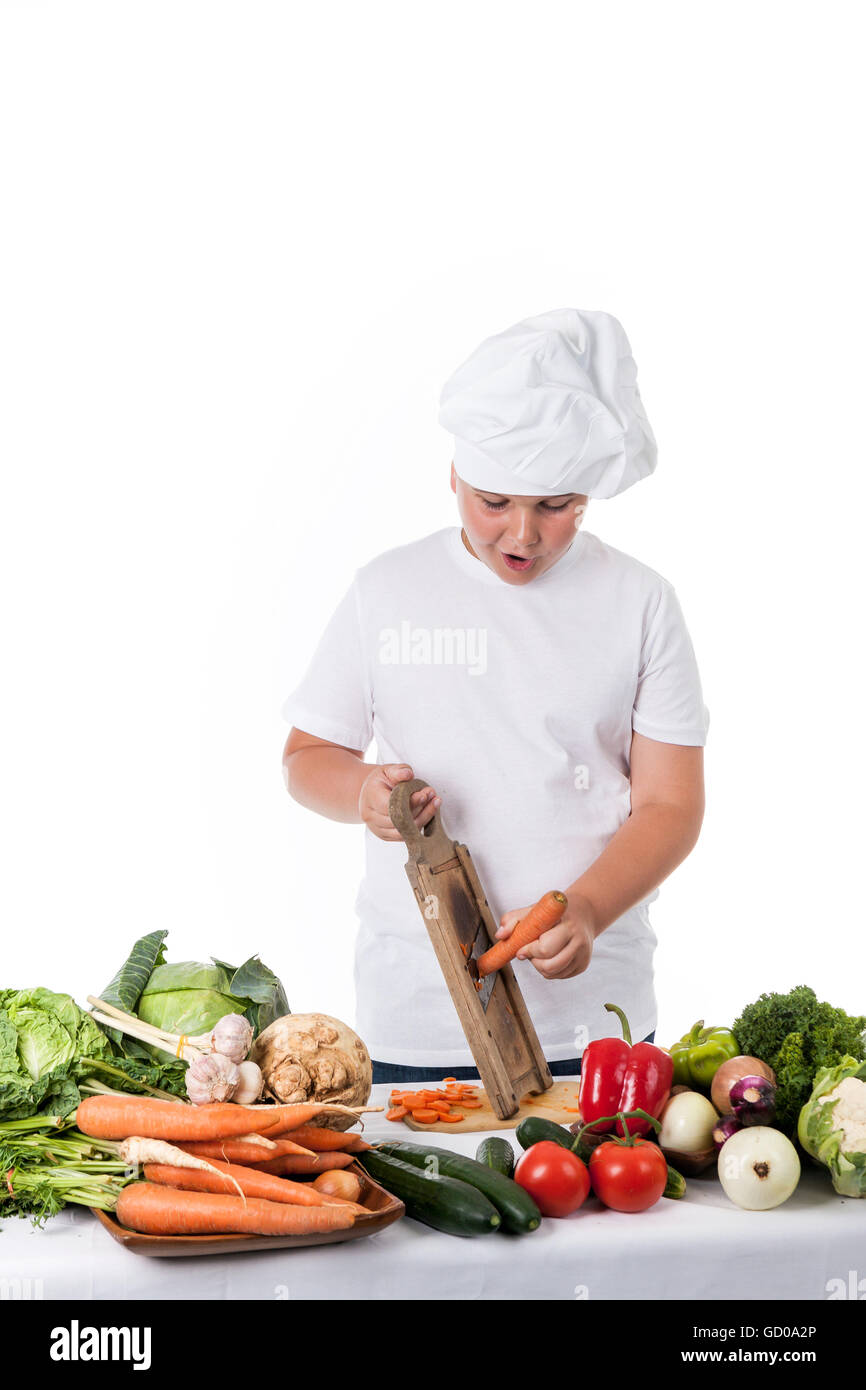 astonished young cook grating carrots Stock Photo - Alamy