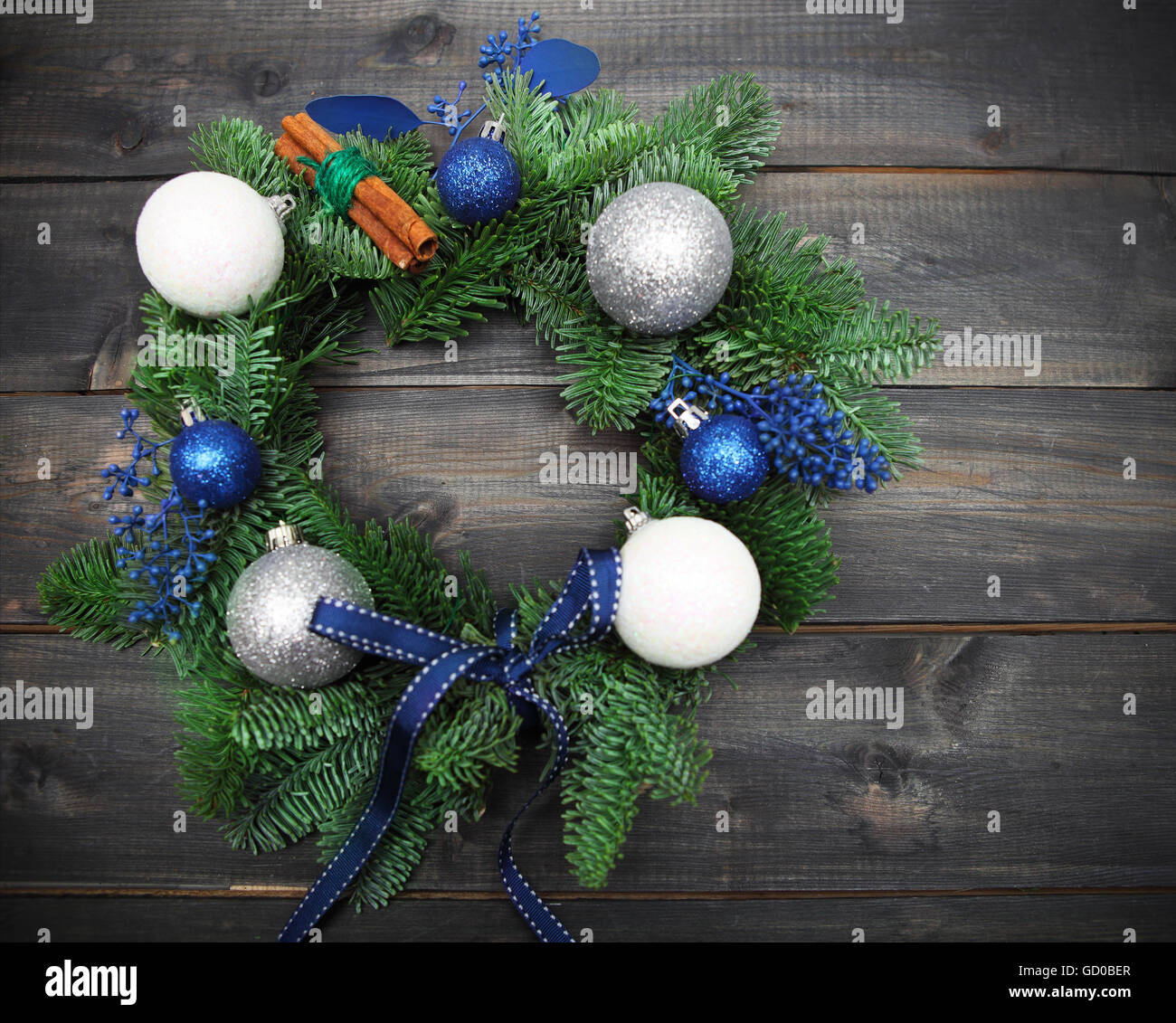 Advent Christmas wreath on wooden rustic background Stock Photo - Alamy