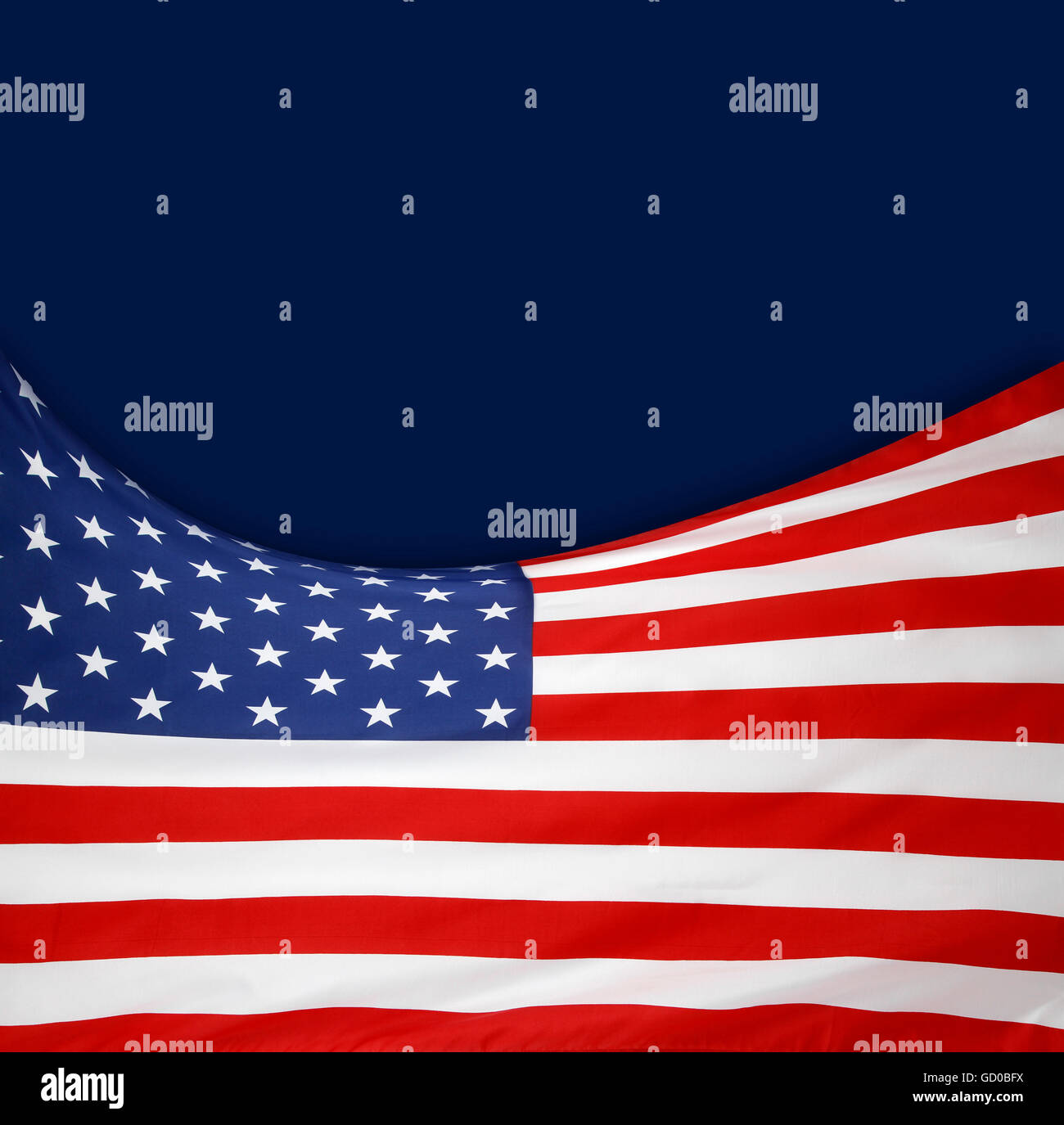 American flag on blue background Stock Photo - Alamy