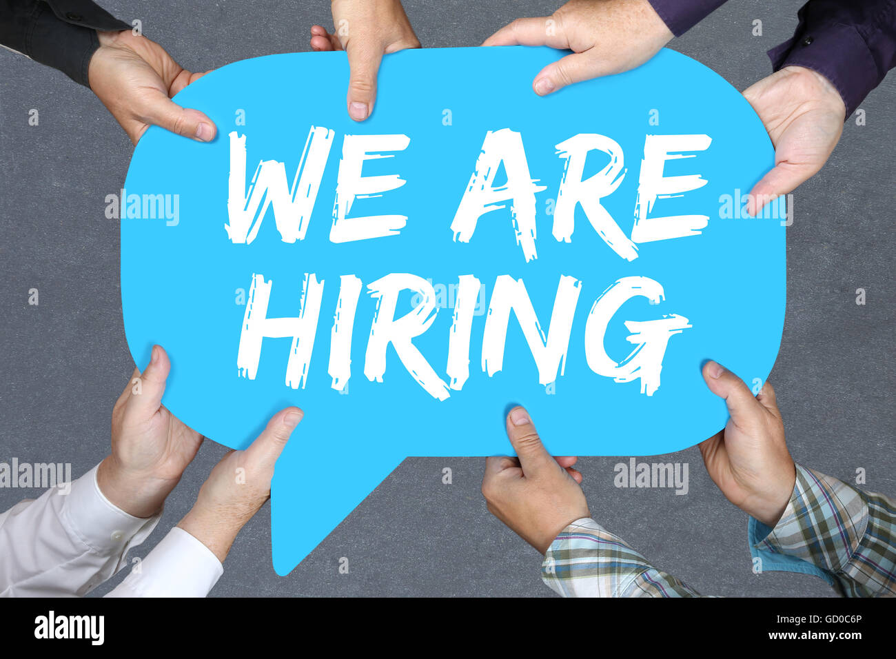 Group of people holding with hands the word We are hiring jobs, job ...