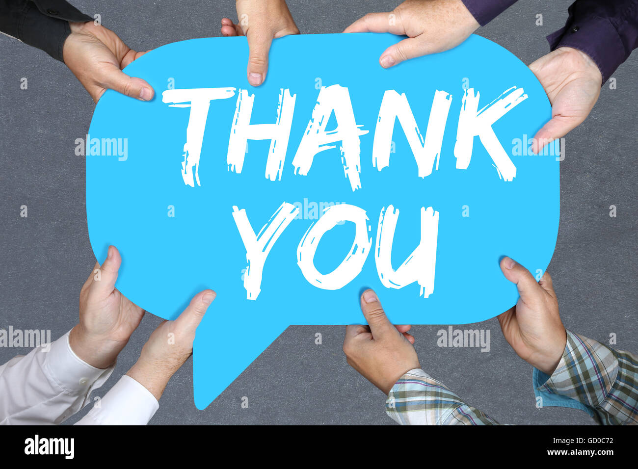 Group of people holding with hands the word thank you Stock Photo - Alamy