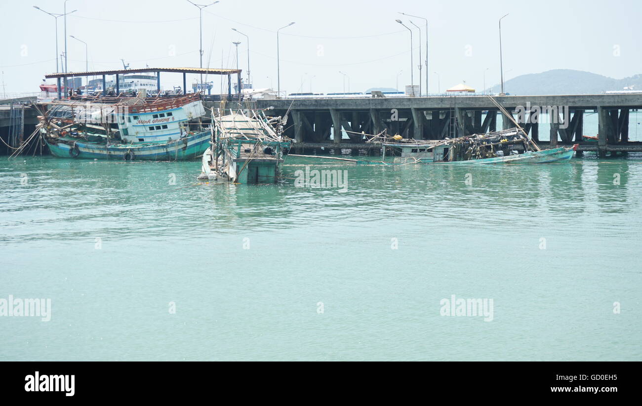 ship cemetery in blue sea Stock Photo - Alamy