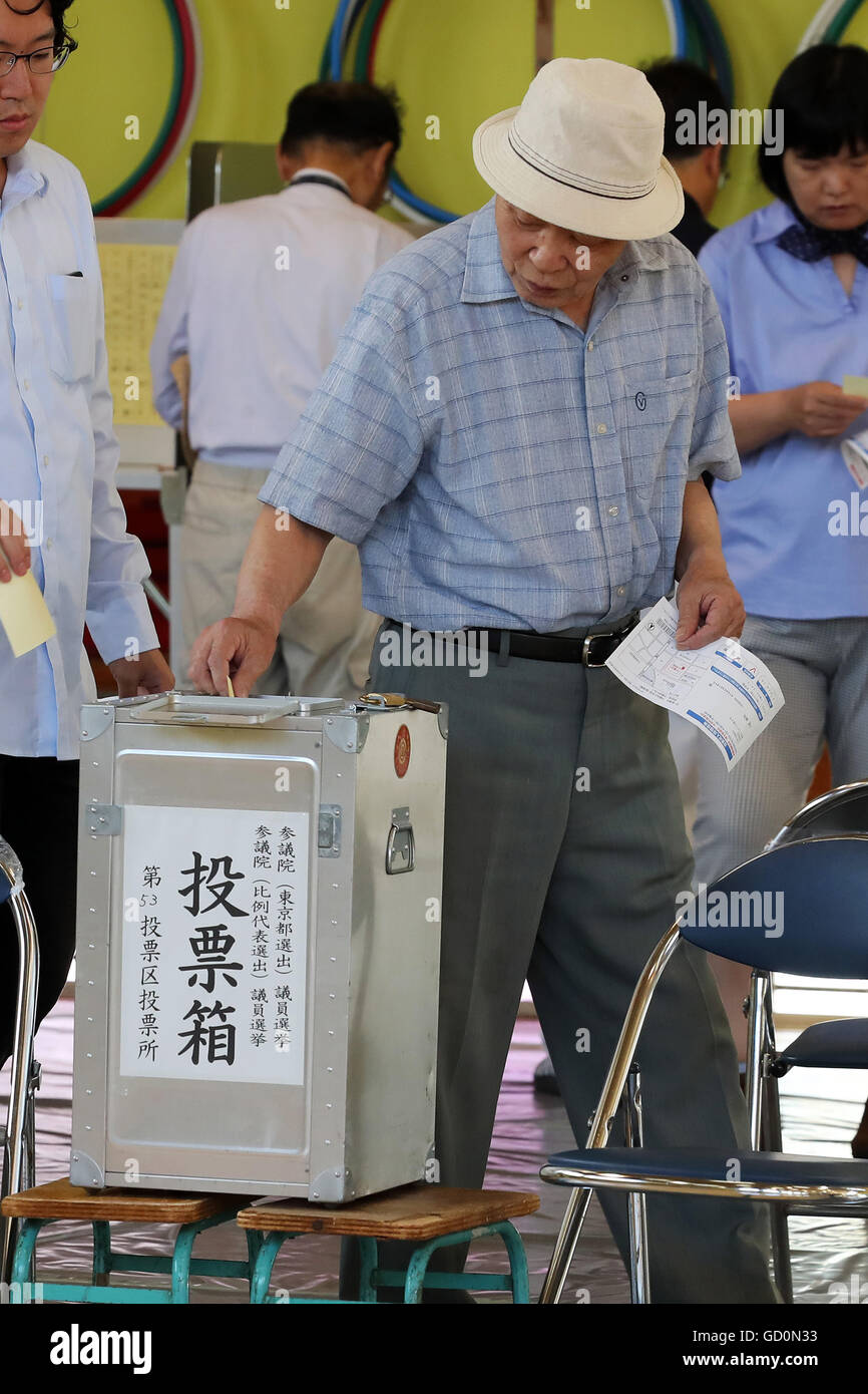 Tokyo, Japan. 10th July, 2016. A voter casts a vote in Japan's Upper ...