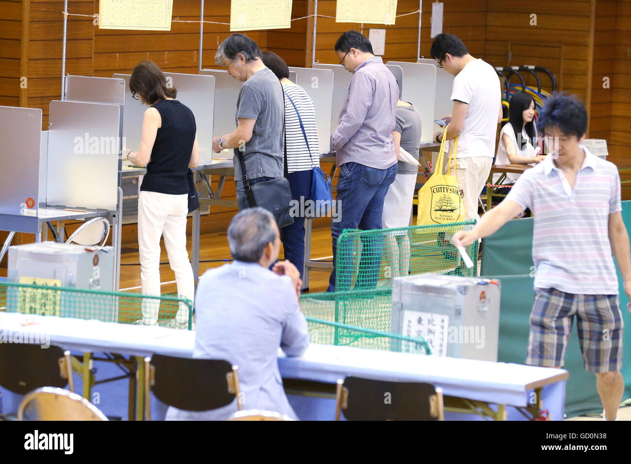 Voters fill out their ballots in Japan's upper house election at a ...