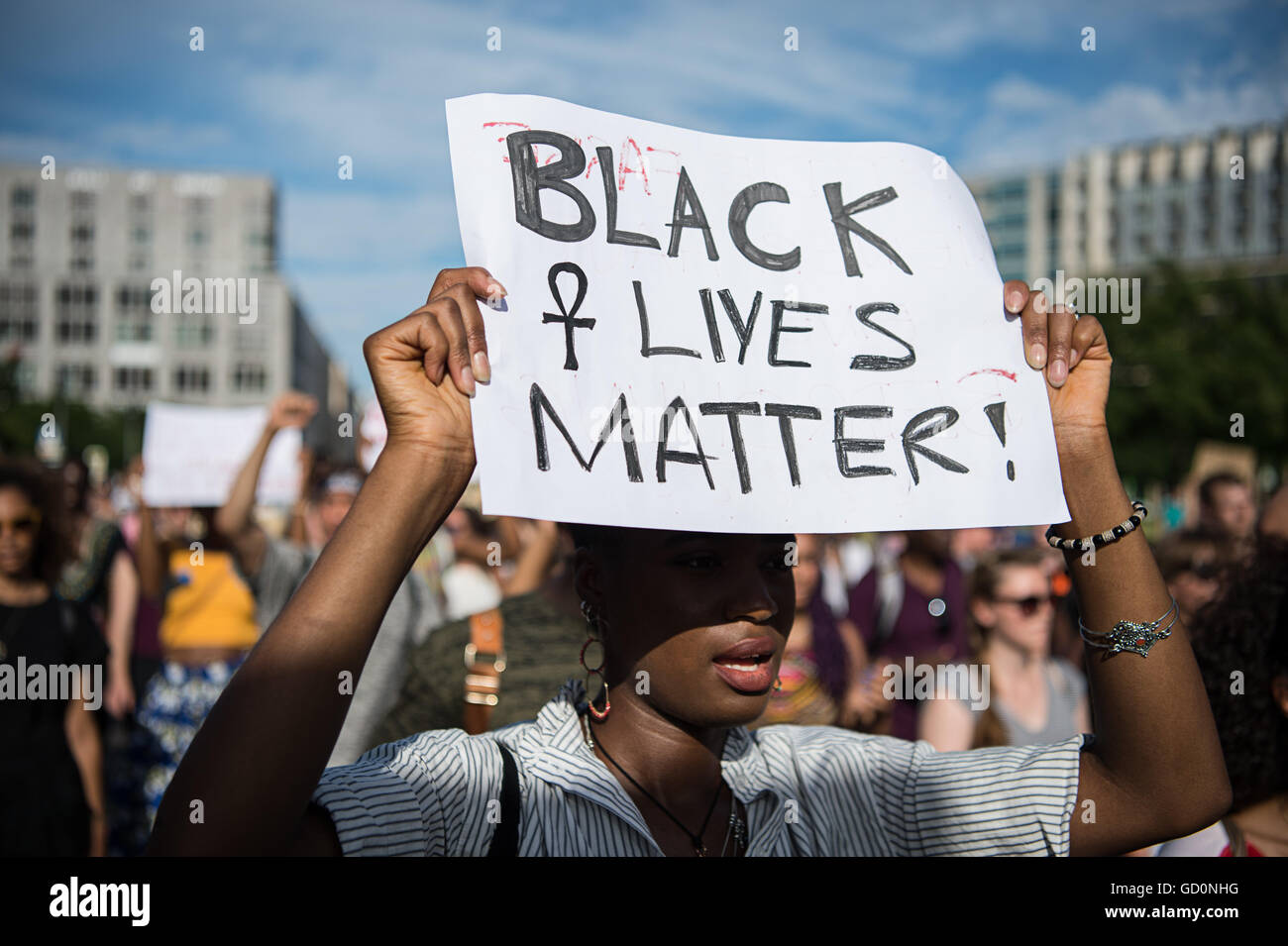 Berlin, Germany. 10th July, 2016. Demonstrators held a banner with the ...