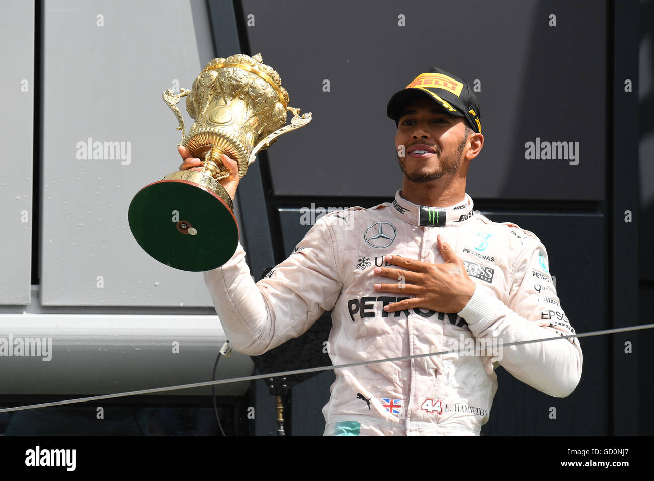 Silverstone, UK. 10th July, 2016. Lewis Hamilton celebrates winning the ...