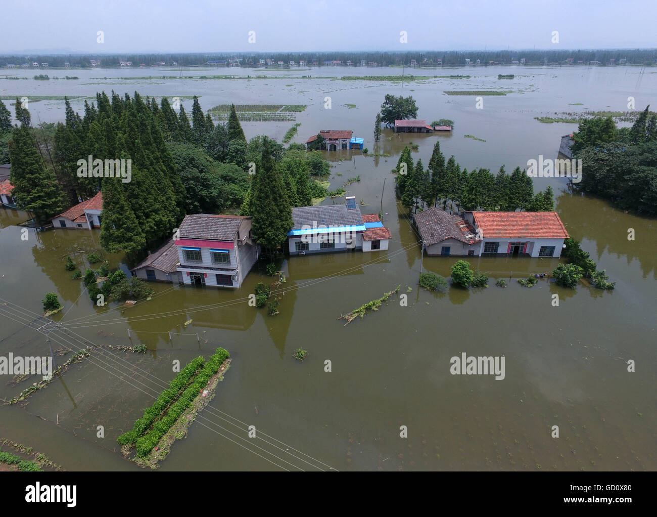 Huarong, China's Hunan Province. 11th July, 2016. The flooded area is ...