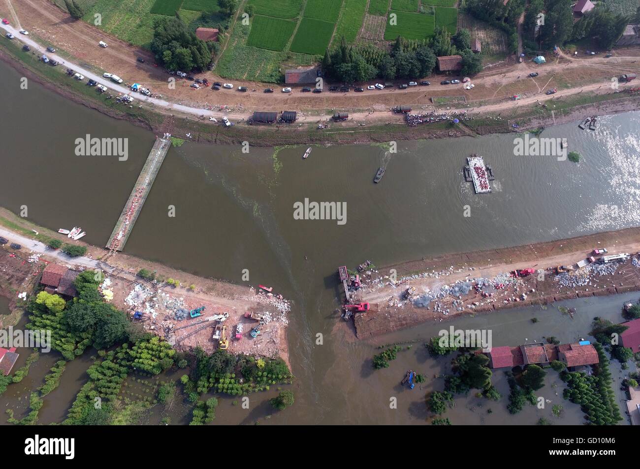 Huarong, China's Hunan Province. 11th July, 2016. A floating bridge is ...