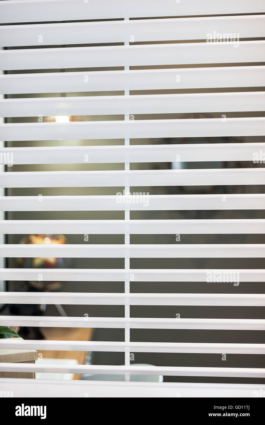 White window with a vertical filter cover that spreading light and ...
