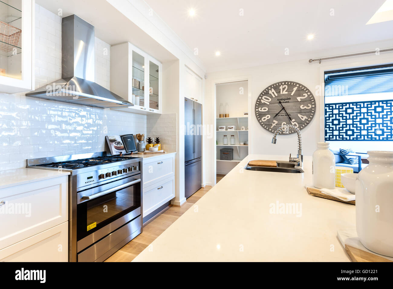 Luxury kitchen closeup with counter top and stove under the oven next ...