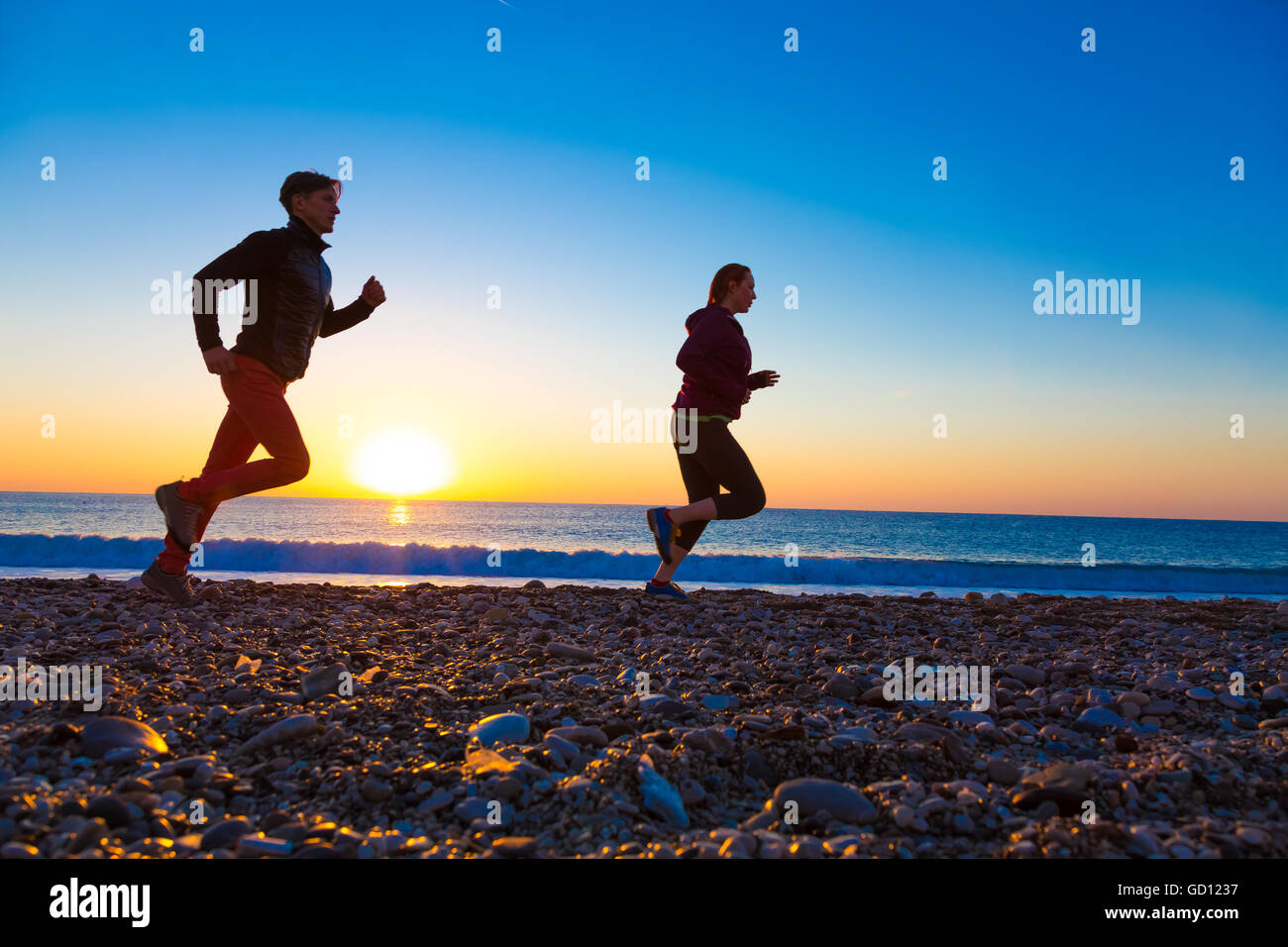 Female jogging exercise beach hi-res stock photography and images - Alamy