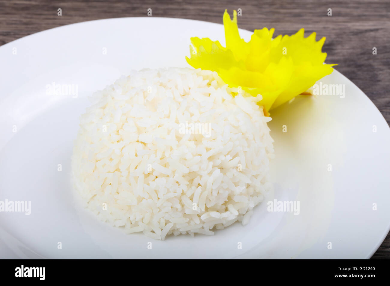 Hot long Steamed rice on the plate Stock Photo - Alamy