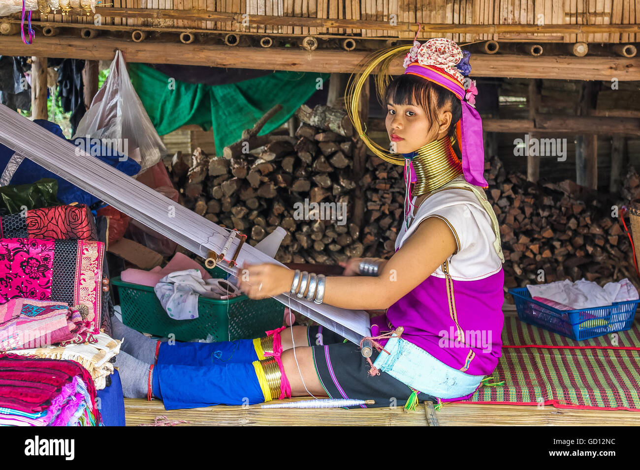Kayan girl with loom Stock Photo - Alamy