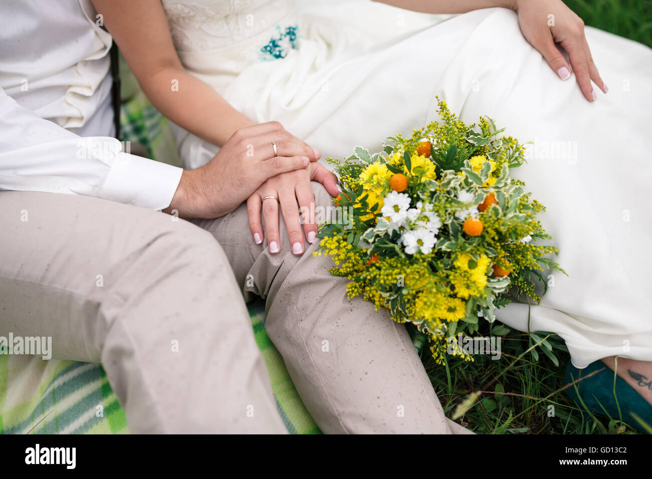 Hands of the grrom and bride close up Stock Photo - Alamy