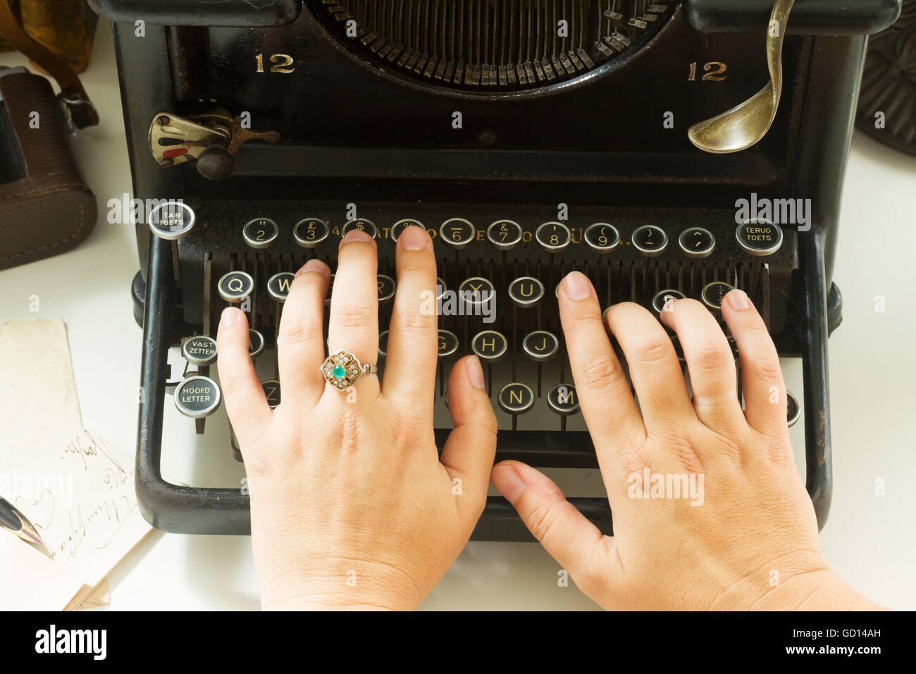Typing on typewriter top view hi-res stock photography and images - Alamy