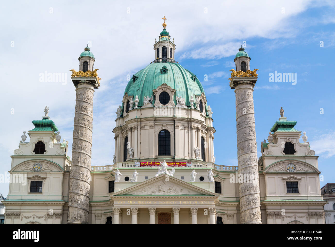 Top of front facade of Karlskirche (Charles Church) with dome and ...