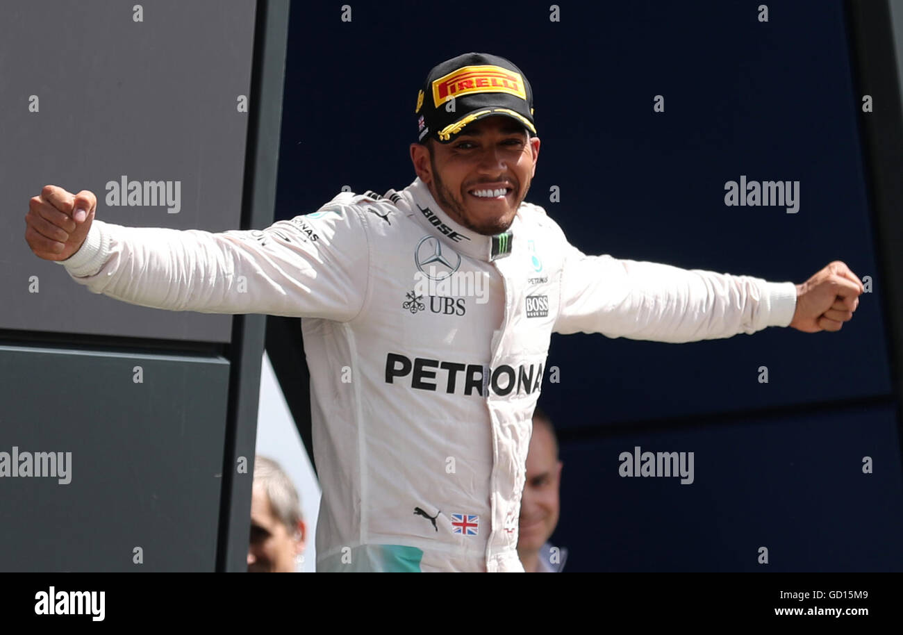 Mercedes' Lewis Hamilton celebrates winning the British Grand Prix ...