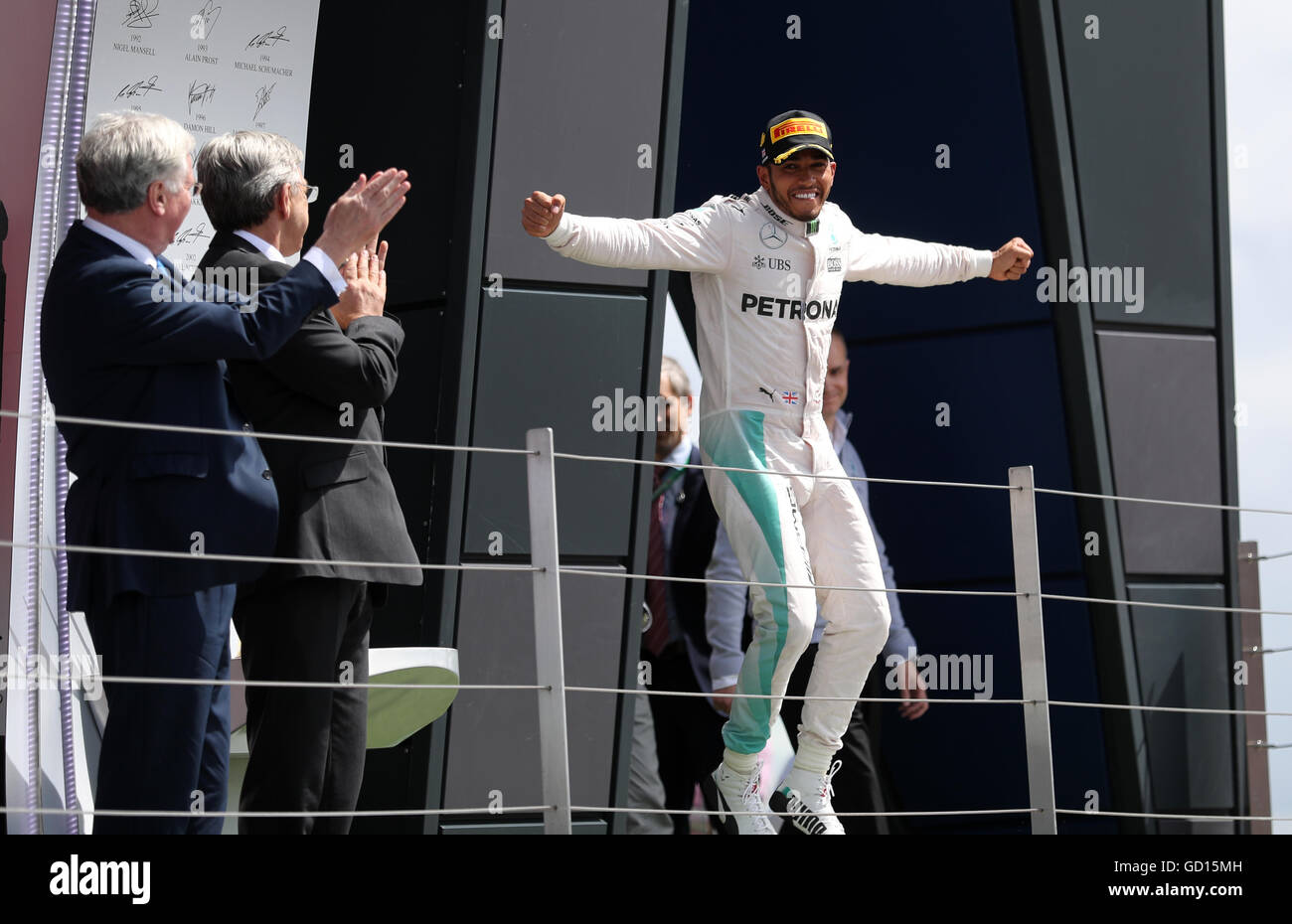 Mercedes' Lewis Hamilton celebrates winning the British Grand Prix ...