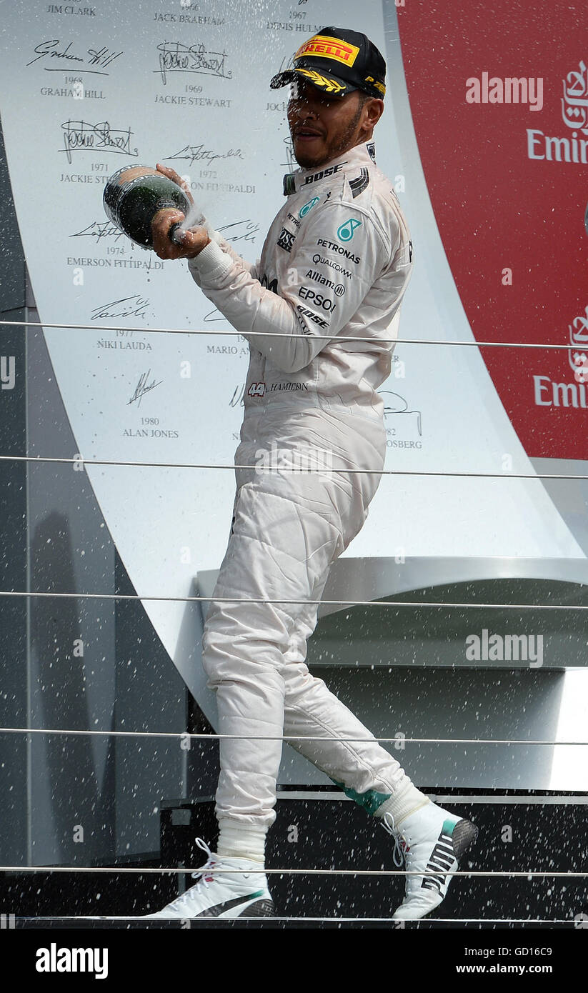 Mercedes' Lewis Hamilton celebrates winning the 2016 British Grand Prix ...