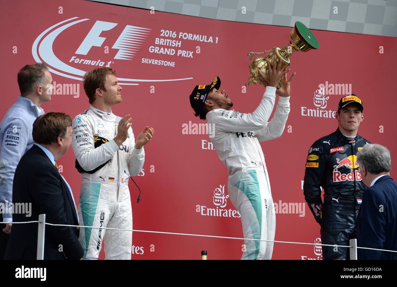 Mercedes' Lewis Hamilton (centre) celebrates winning the 2016 British ...