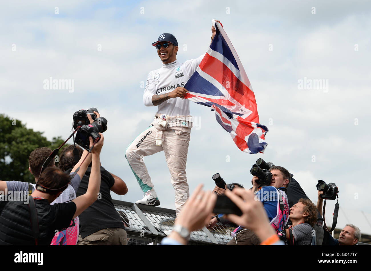 Mercedes' Lewis Hamilton celebrates winning the 2016 British Grand Prix ...