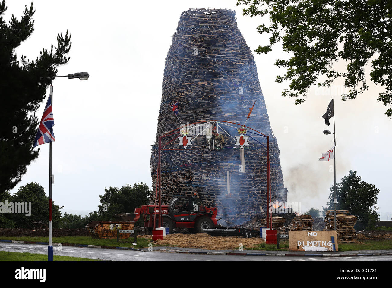 Men construct a bonfire in the Ballymacash area of Lisburn, as building ...