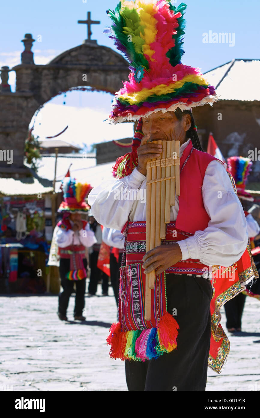 TAQUILE, PERU - JULY 29, 2012: Musicians and Dancers During a Festival ...