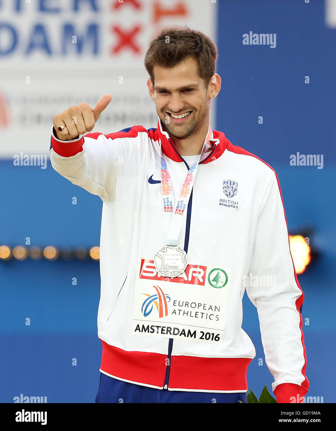 Great Britain's Robbie Grabarz celebrates on the podium after winning ...