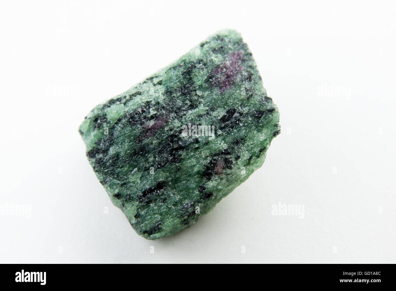 macro photo of ruby inside of zoisite isolated over white Stock Photo ...