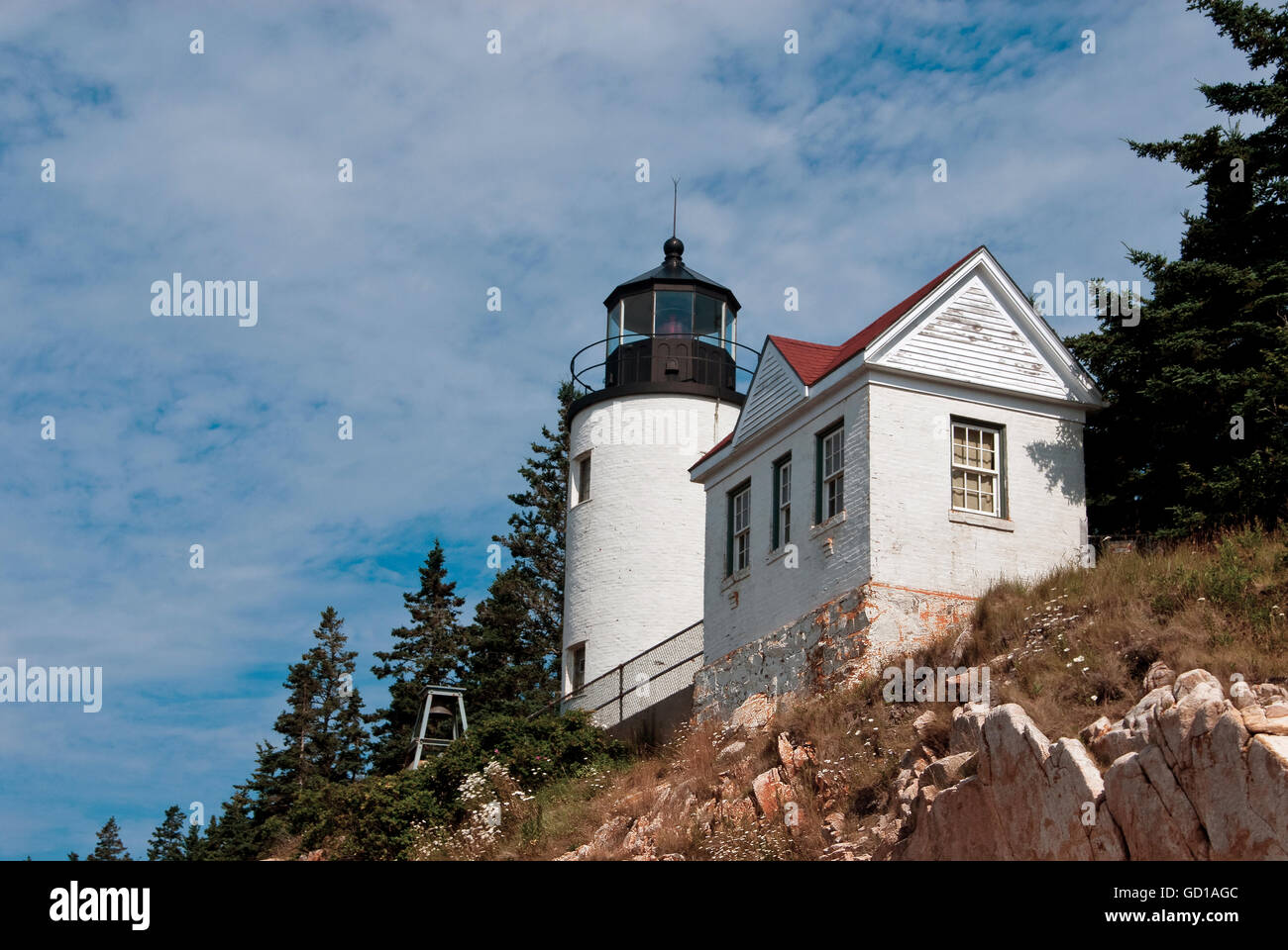 Bass Harbor lighthouse sits atop a rocky cliff in Acadia National Park ...
